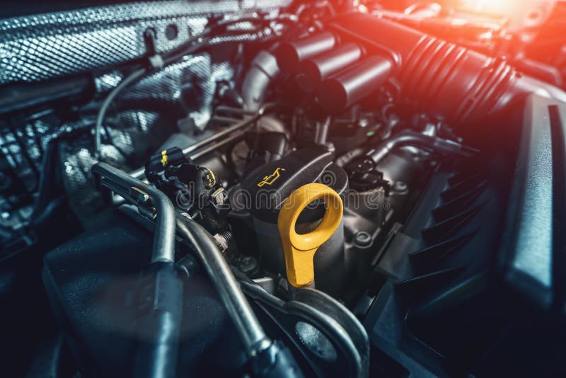 Engine Compartment Under Car Hood with Emphasis on Oil Dipstick ...