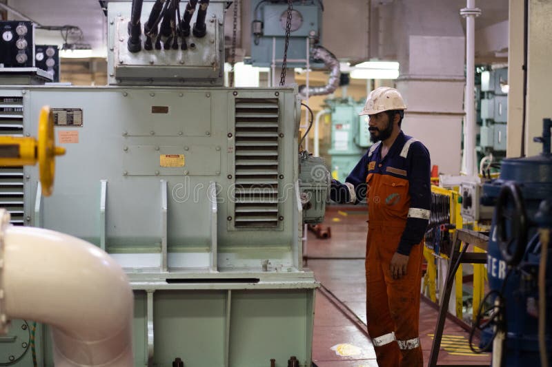 Engine Crew Taking Rounds in Engine Room Generator Editorial ...