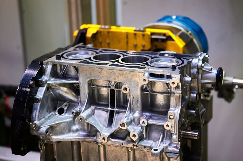 Engine Cylinder Block with Installed Pistons in Workshop Stock Image ...