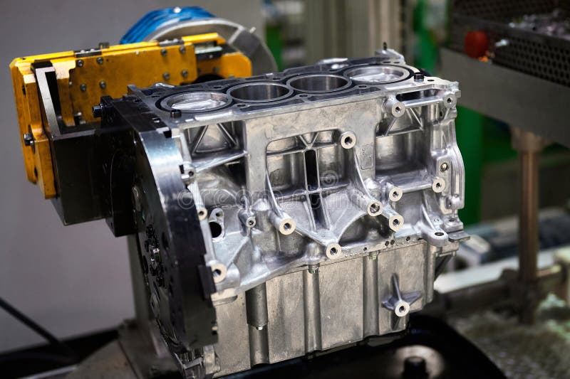Engine Cylinder Block with Installed Pistons in Workshop Stock Photo ...