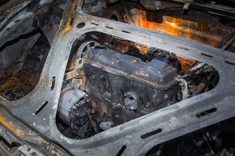 Engine of a burned car stock photo. Image of charred - 117979208