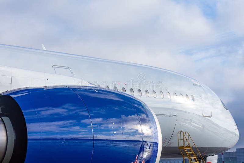 The Engine and Fuselage of a Passenger Plane and the Cockpit for ...
