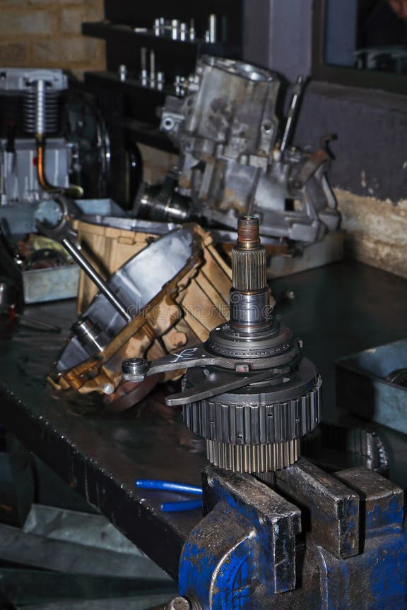 Engine Gear Assembly on Workshop Bench Vice Stock Photo - Image of head ...