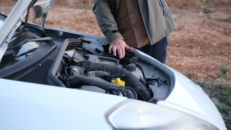 Car Engine Hood with Many Hail Damage Dents Show the Forces of Nature ...