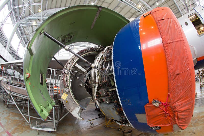 Engine of Modern Passenger Jet Plane Close Up. the Bonnet is Open ...