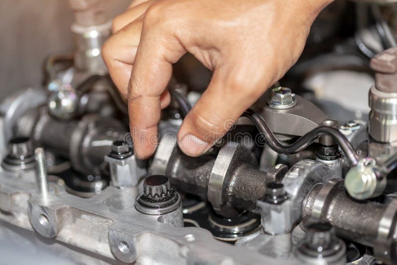 Close Up on Man Hands. Mechanic Pouring New Engine Oil To Motorcycle ...