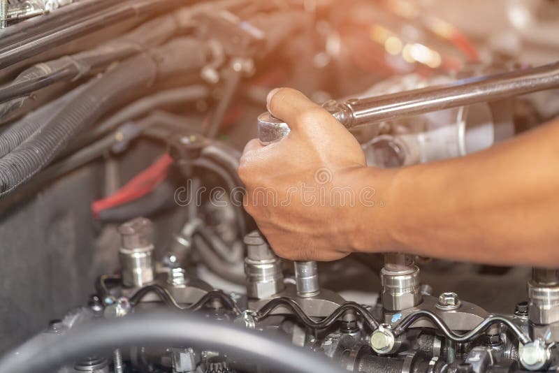 Close Up on Man Hands. Mechanic Pouring New Engine Oil To Motorcycle ...
