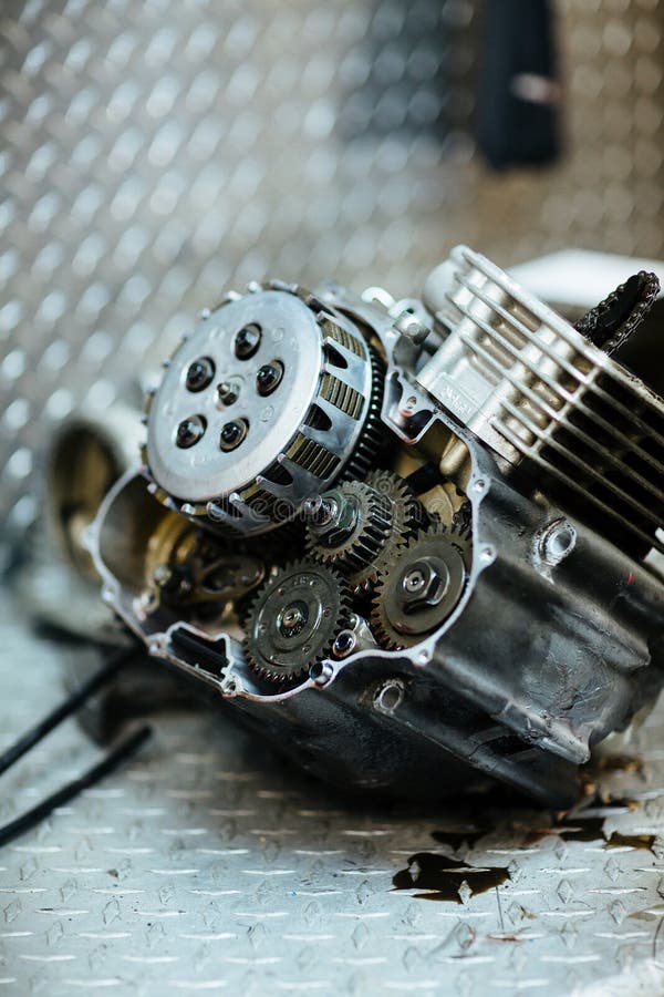 Engine on Table in Garage stock image. Image of gear - 93685611