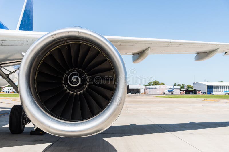 Engine and a Wing of an Aircraft Plane at the Airport. Stock Photo ...