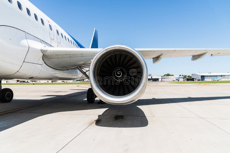 Engine and a Wing of an Aircraft Plane at the Airport. Stock Image ...