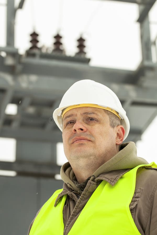 Engineer on a Transformer Background Stock Photo - Image of hard ...