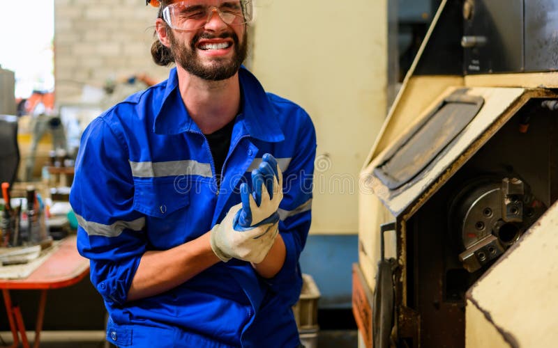 Engineer with Accident at Factory, People with Injury from Hard Work in ...
