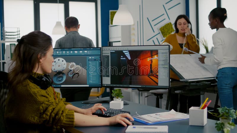 Engineer Analysing Cad Software To Develop Video Game Stock Photo ...