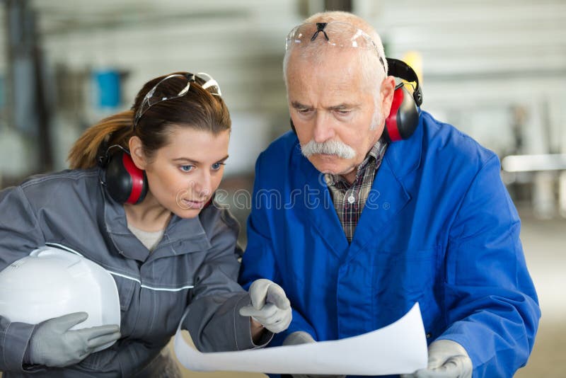 Engineer and Apprentice Planning Project Stock Image - Image of ...