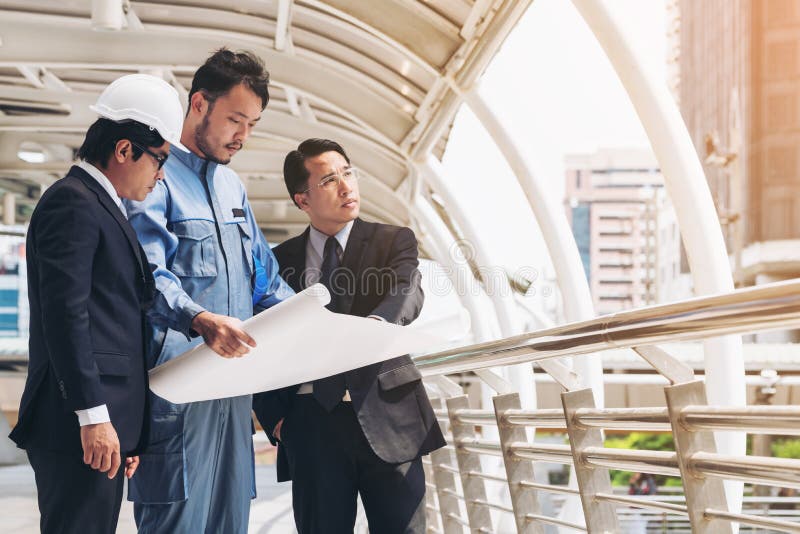 Engineer and Business Man Discuss about Blueprint Stock Image - Image ...