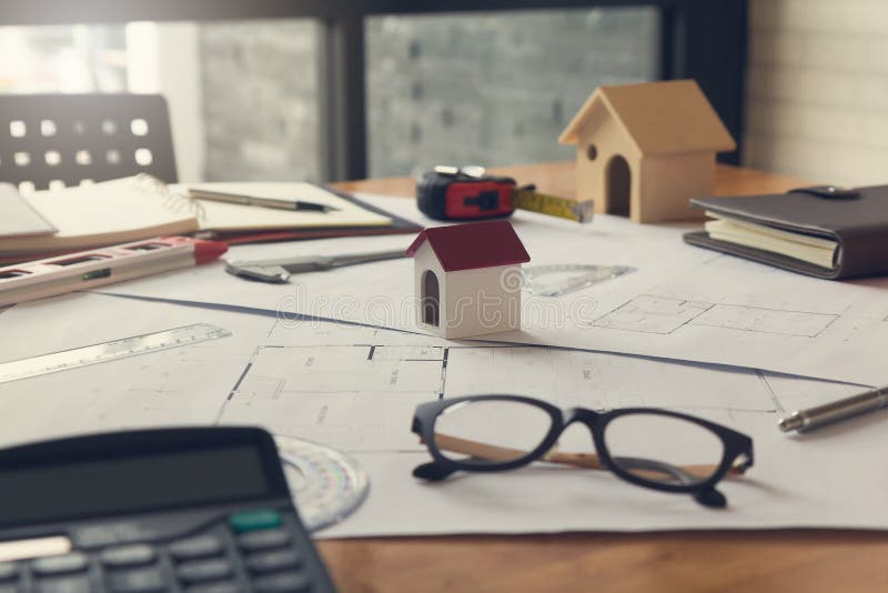 Engineer and Architect Concept, House Model and Blueprint Stock Image ...