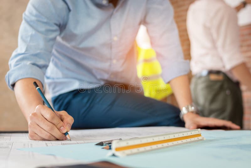 Engineer or Architect Hand Sketch the Drawing Construction Building on ...