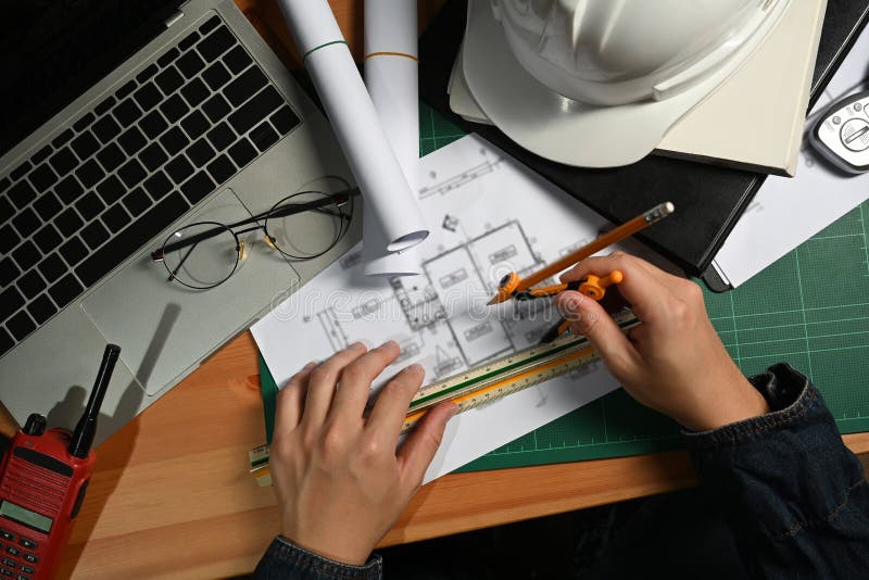 Engineer or Architect Man Working with Blueprints, Planning Development ...