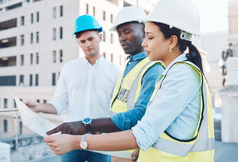 Engineer, Architect and Planning with Blueprint on a Construction Site ... Engineer, Architect and Planning with Blueprint on a Construction Site ...