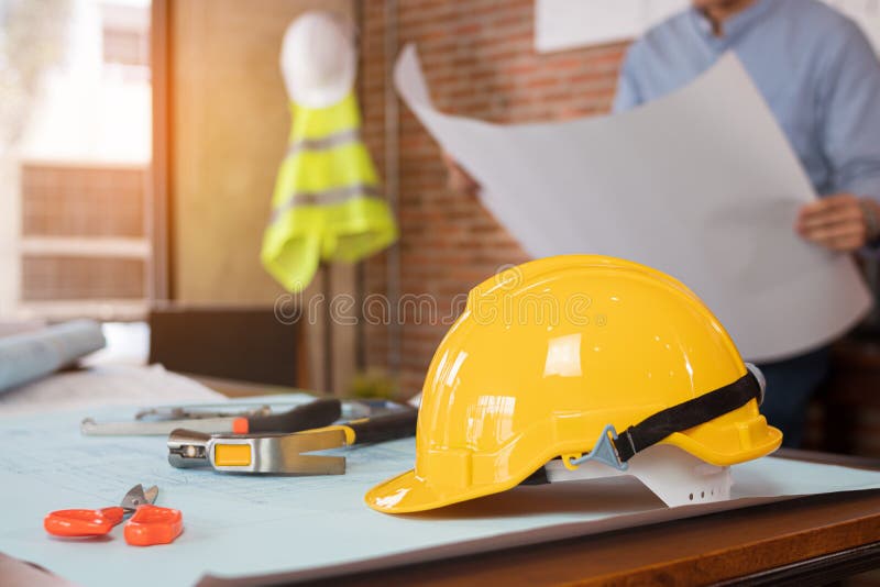 Engineer or Architect is Reading Paper Blueprint Project Plan. Civil ...