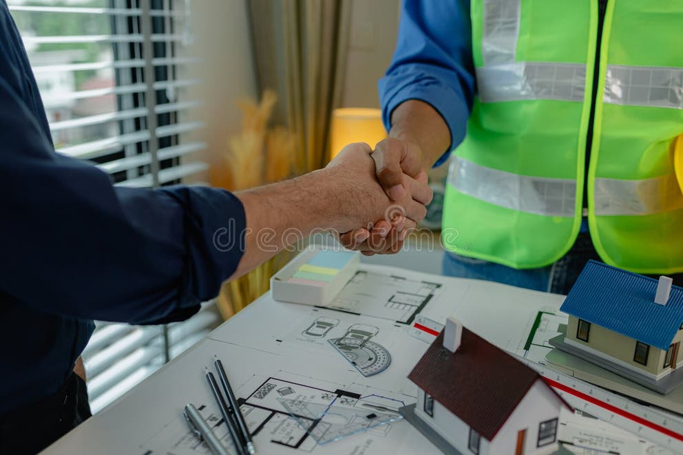 Engineer and Architect are Shaking Hands To Celebrate because they Just ...