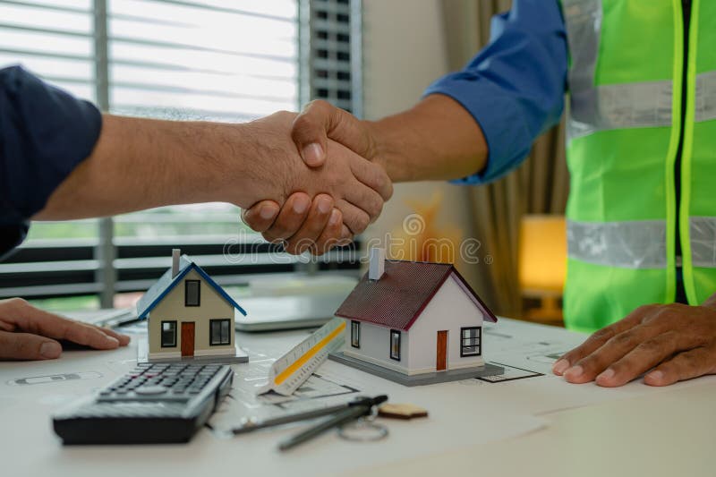 Engineer and Architect are Shaking Hands To Celebrate because they Just ...