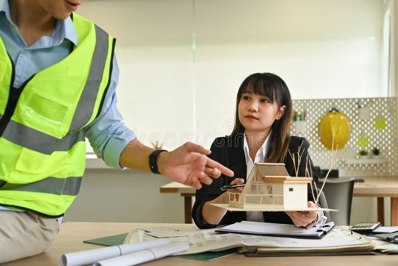 Engineer or Architect Team Brainstorming, Planning Development Details ...