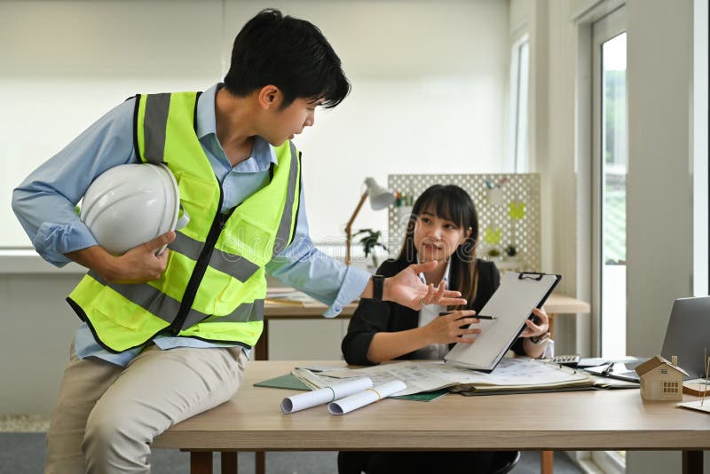 Engineer or Architect Team Brainstorming, Planning Development Details ...