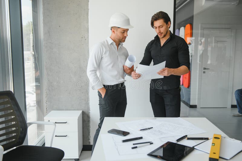 Engineer or Architect Teamwork Working on Construction Project with ...