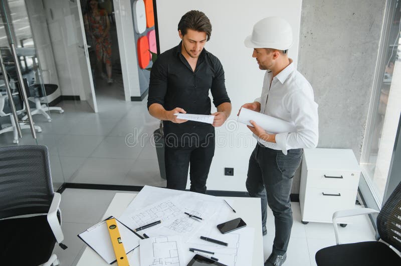 Engineer or Architect Teamwork Working on Construction Project with ...