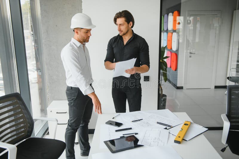 Engineer or Architect Teamwork Working on Construction Project with ...