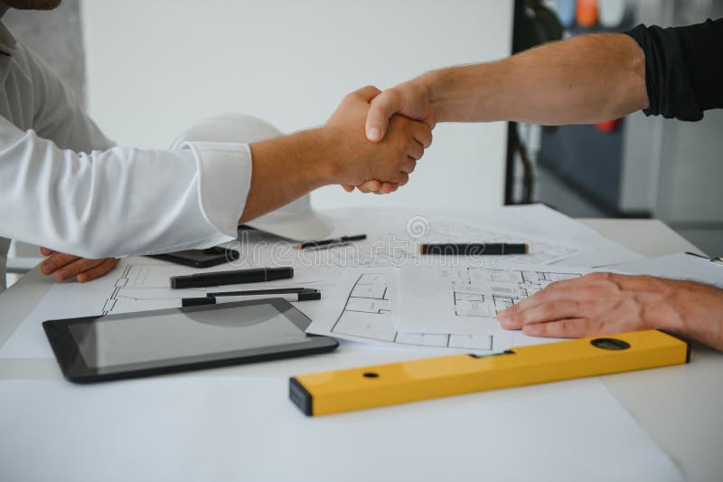 Engineer or Architect Teamwork Working on Construction Project with ...