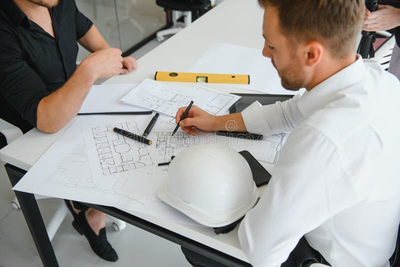 Engineer or Architect Teamwork Working on Construction Project with ...