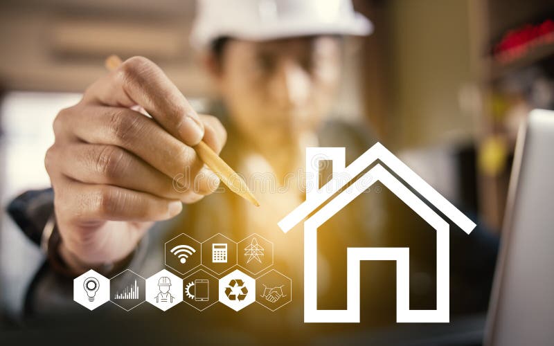 Engineer or Architect Uses a Laptop or Technology for Construction ...