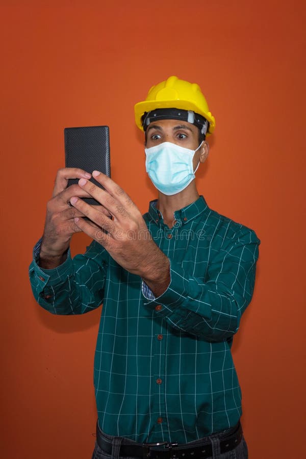 Engineer, Architect or Worker with Yellow Helmet and Pandemic Mask ...