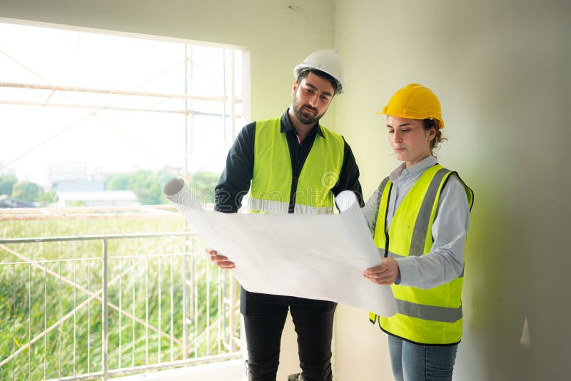 Engineer and Architect Working on the Construction Site, Double ...