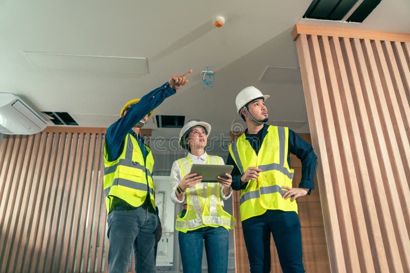 Engineer and Architect Working Discussion Plan in Construction Process ...