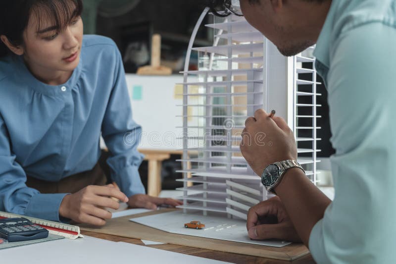 Engineer and Architects Women Discussing To Concept of Building Design ...