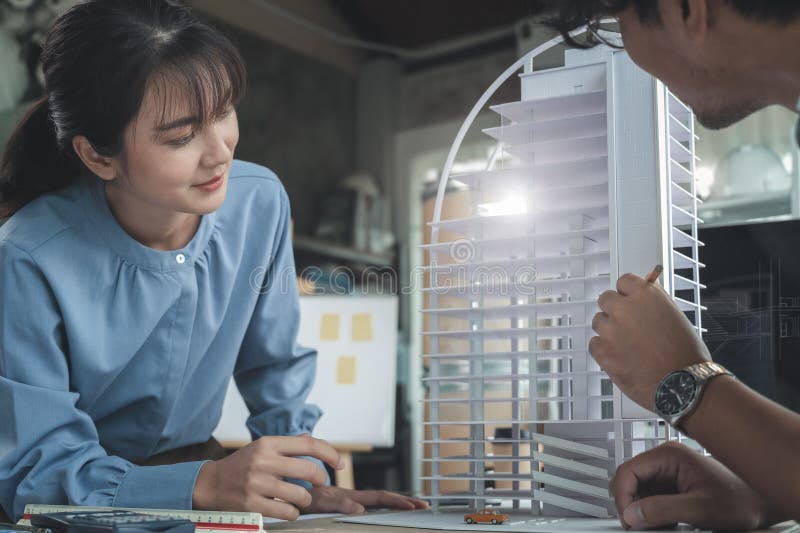 Engineer and Architects Women Discussing To Concept of Building Design ...