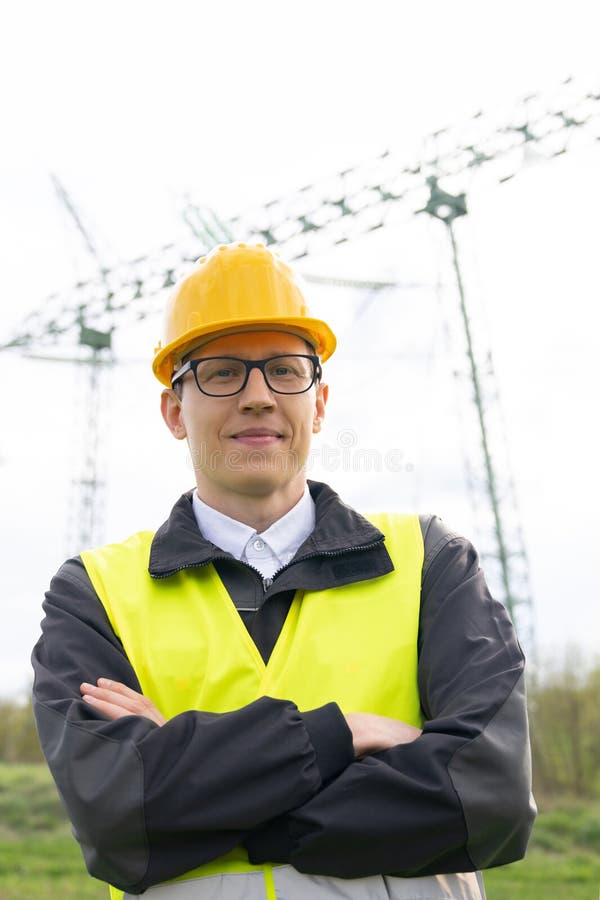 Engineer on a Background of Power Line Tower Stock Photo - Image of ...