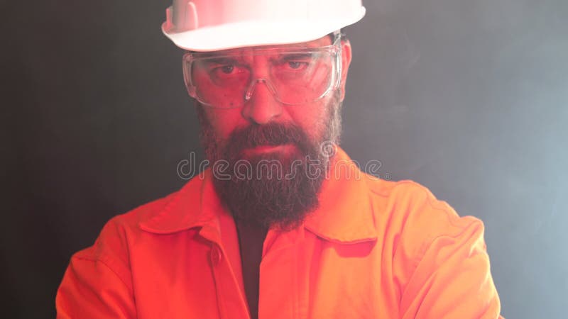 Engineer with Beard Wearing Work Helmet and Reflective Jacket at Night ...