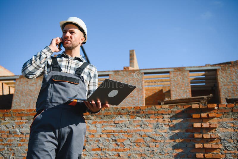 Engineer, Bearded Man Wears Safety Helmet Inspecting Housing ...