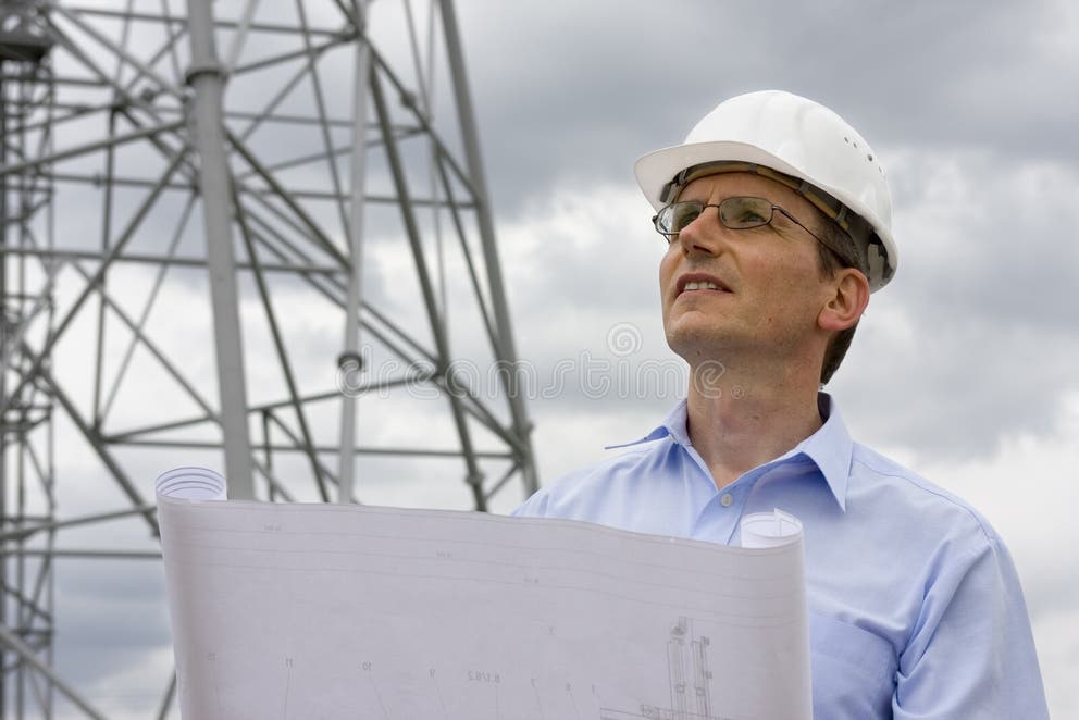 Engineer with blueprint stock image. Image of planning - 10776557