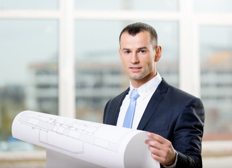 Engineer with blueprint stock image. Image of format - 29207735