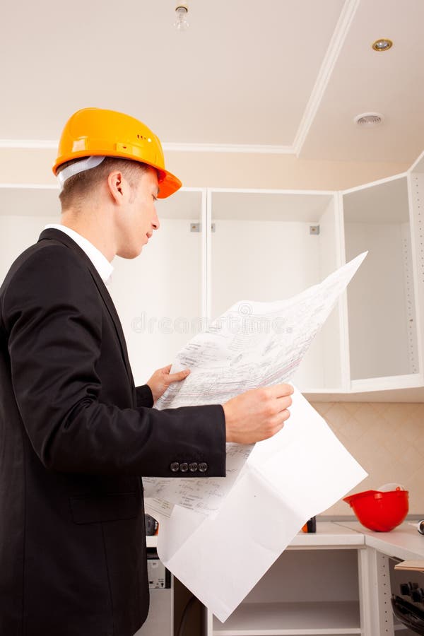 Engineer with blueprints stock image. Image of caucasian - 51606223