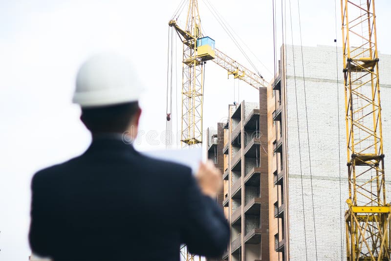 Engineer Boss with Protective Safety Helmet Checking Architectural ...