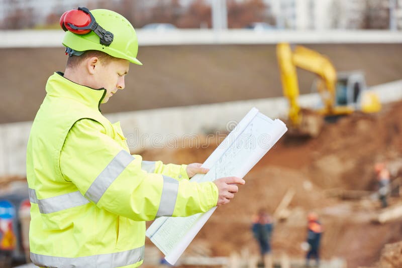 Engineer Builder at Construction Site with Draft Stock Photo - Image of ...