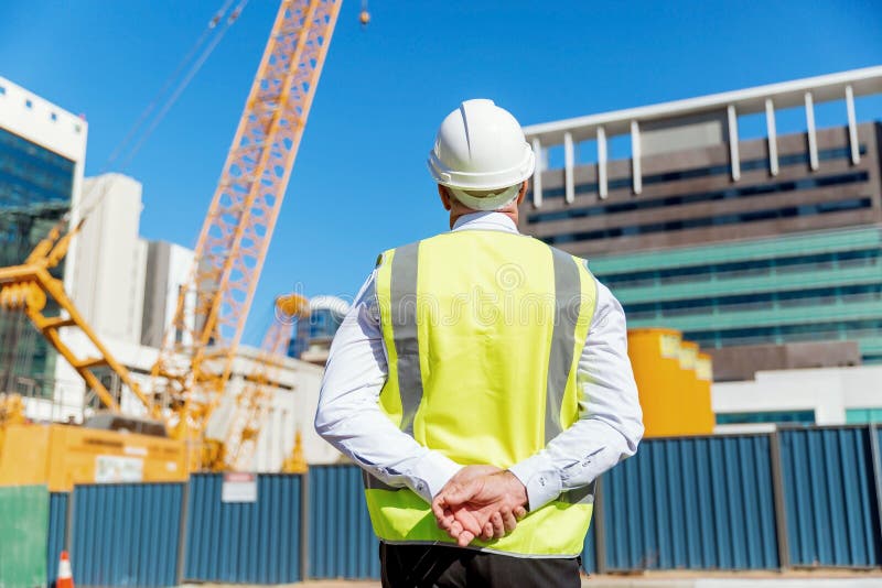 Engineer Builder at Construction Site Stock Photo - Image of ...