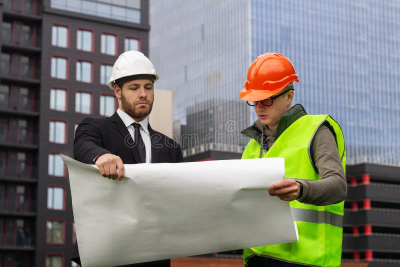 Engineer and Builder Explaining Drawing Architect Plan Professional ...