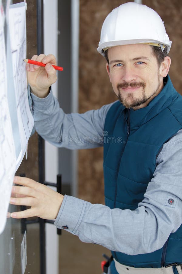Engineer Builder with Plan at Construction Site Stock Image - Image of ...